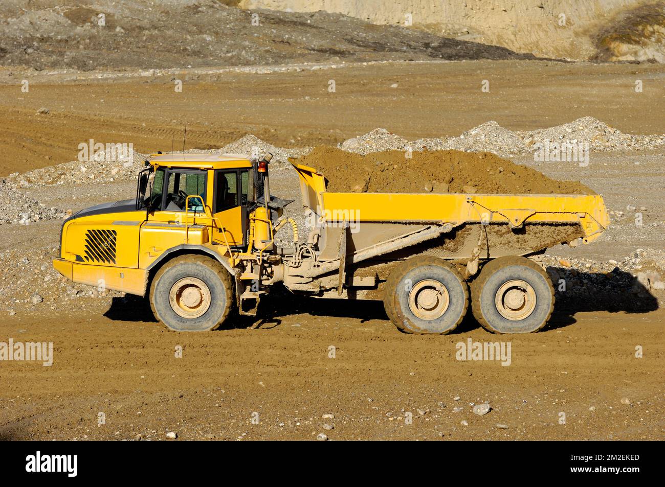 Huge dump truck working in hi-res stock photography and images - Alamy