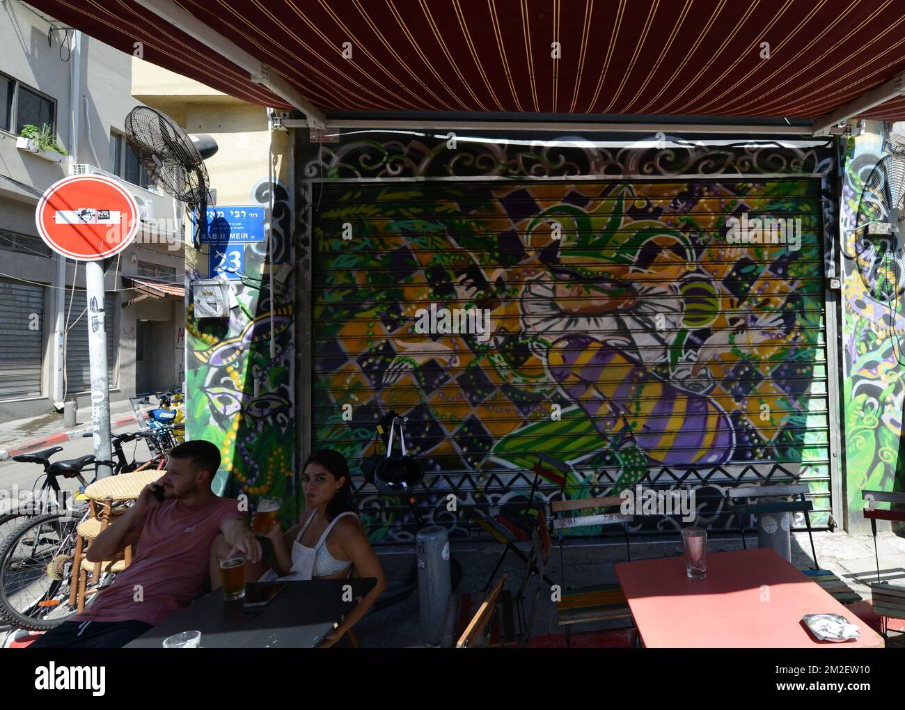Vibrant bars in the narrow street of the Carmel market in Tel-Aviv ...