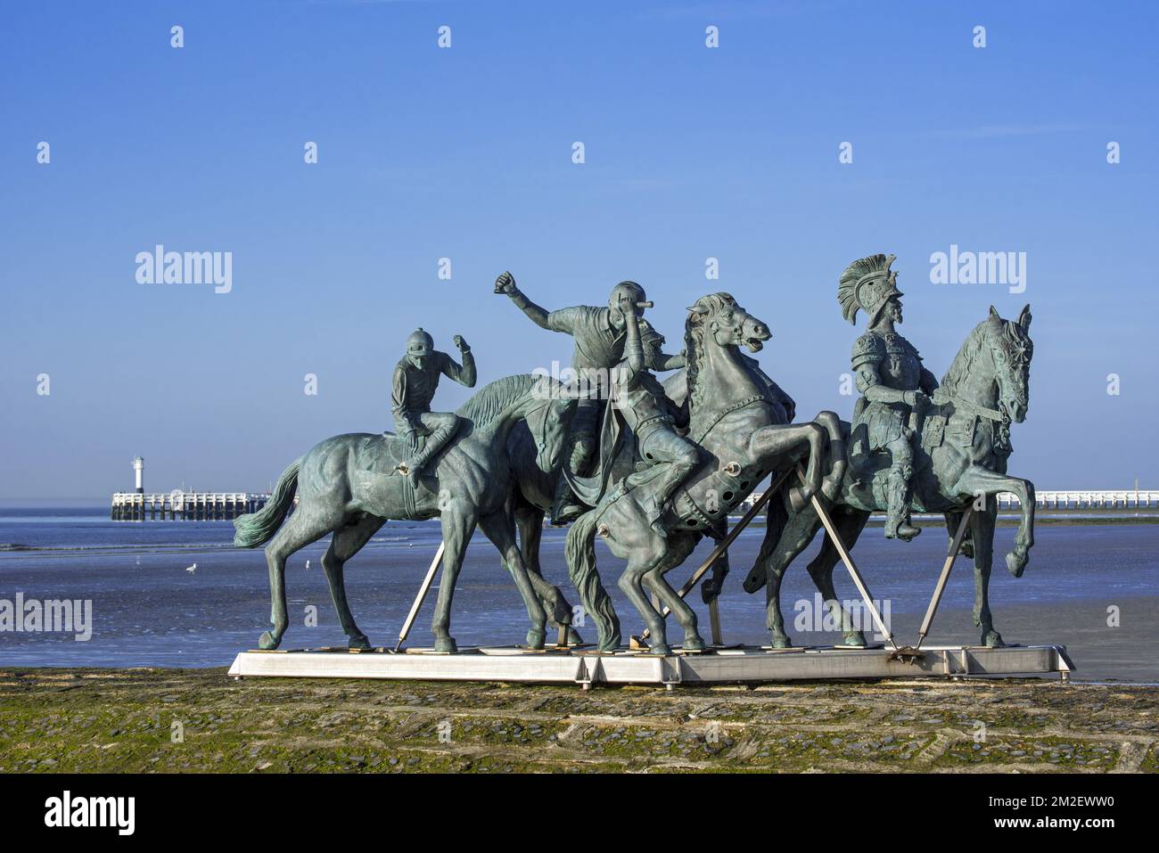 Men, bronze sculpture on breakwater by artist Nina Beier during ...
