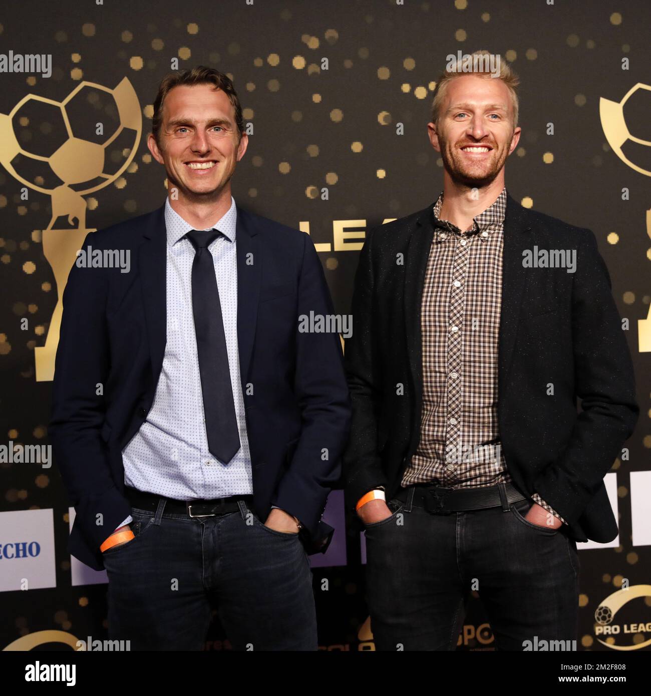 STVV's head coach Jonas De Roeck and Antwerp's assistant coach Wim De ...