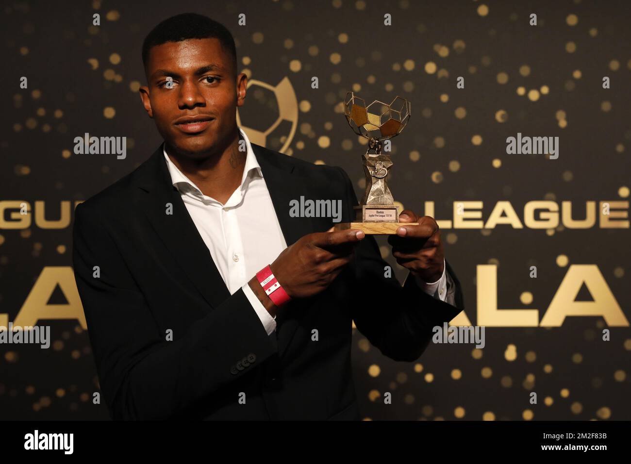 Club's Wesley Moraes poses with his 'rookie of the year' trophy on the ...