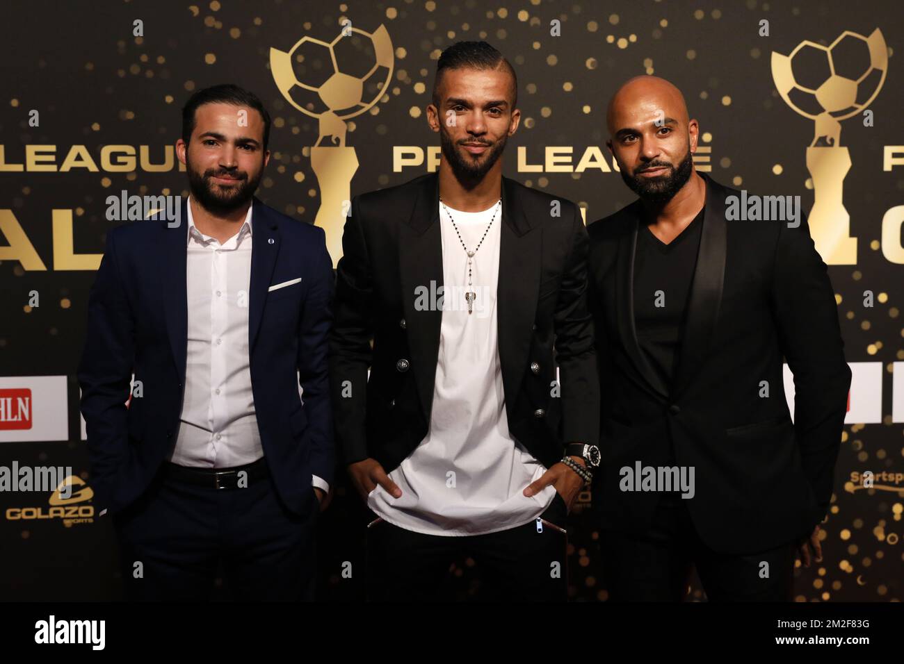 Standard's Mehdi Carcela (C) pictured on the red carpet at the arrival ...