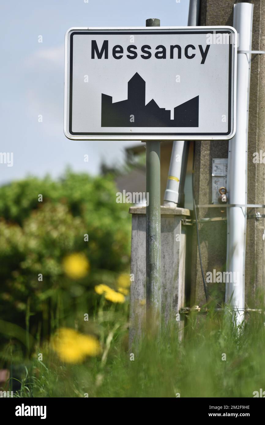 Illustration shows the name of the Messancy municipality on a road sign ...