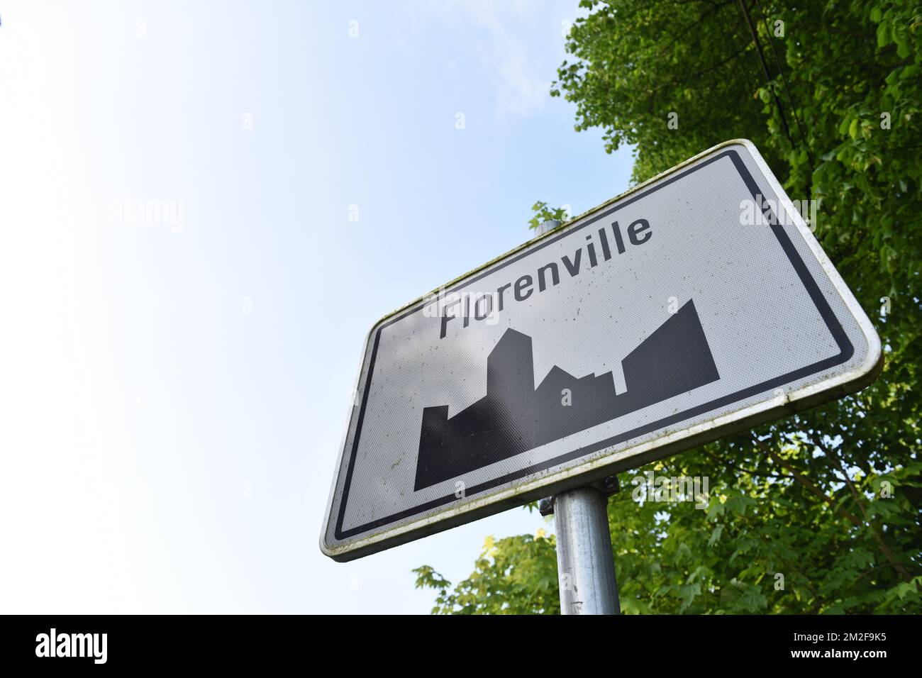 Illustration shows the name of the Florenville municipality on a road ...