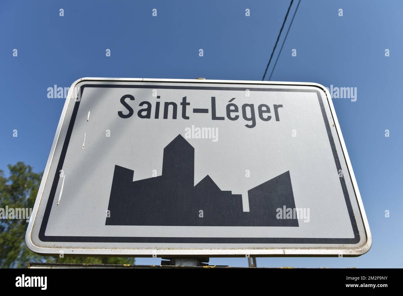 Illustration shows the name of the Saint-Leger municipality on a road ...
