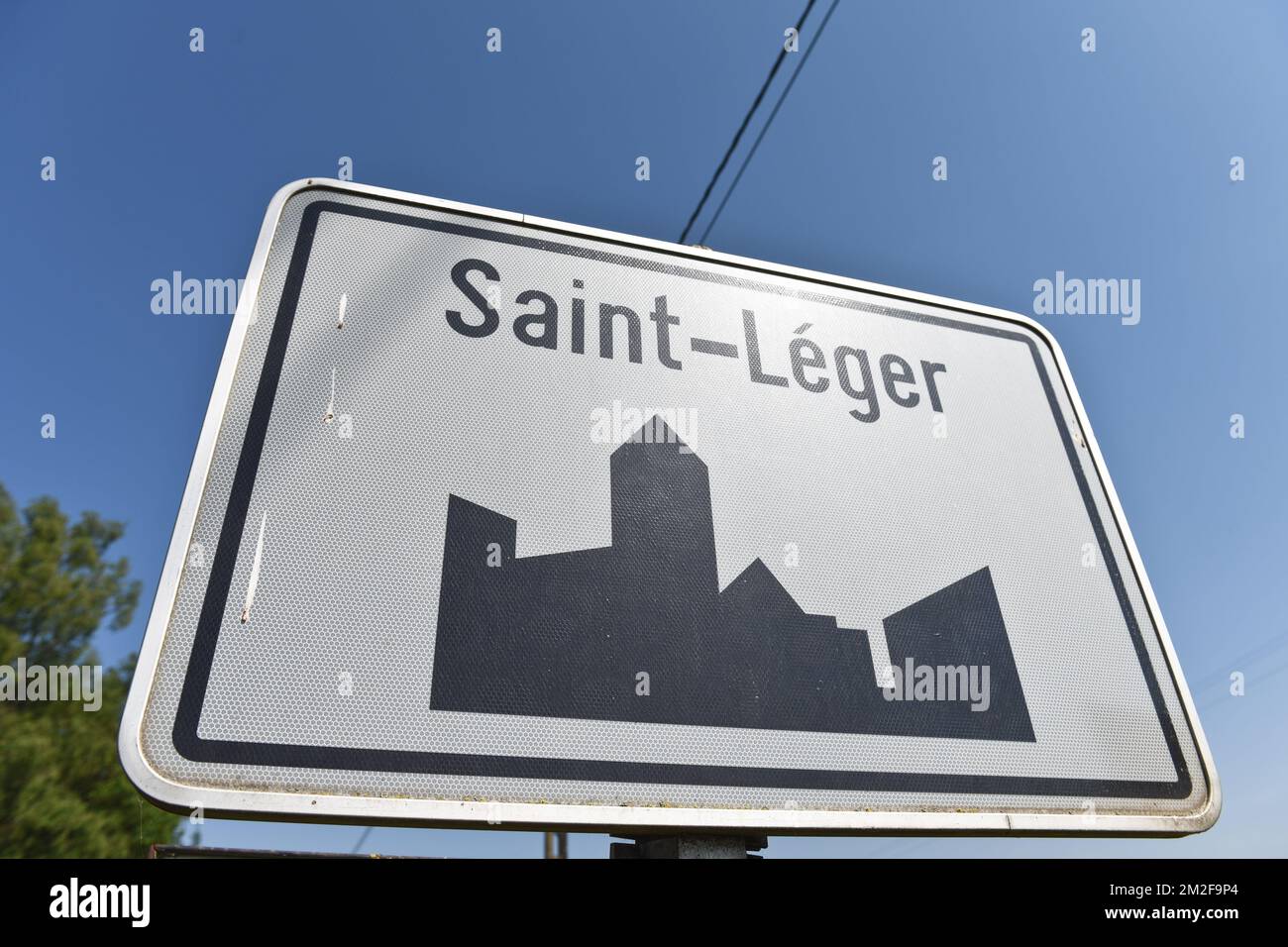 Illustration shows the name of the Saint-Leger municipality on a road ...