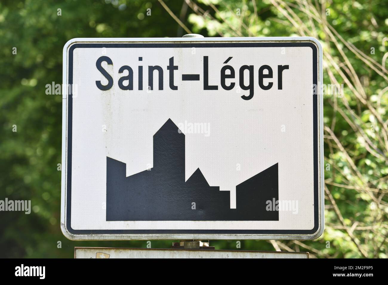 Illustration shows the name of the Saint-Leger municipality on a road ...
