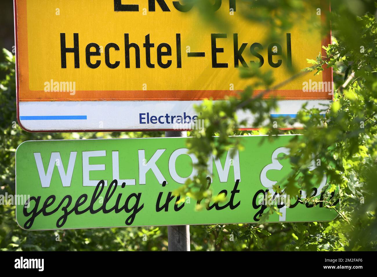 Illustration shows the name of the Hechtel-Eksel municipality on a road ...