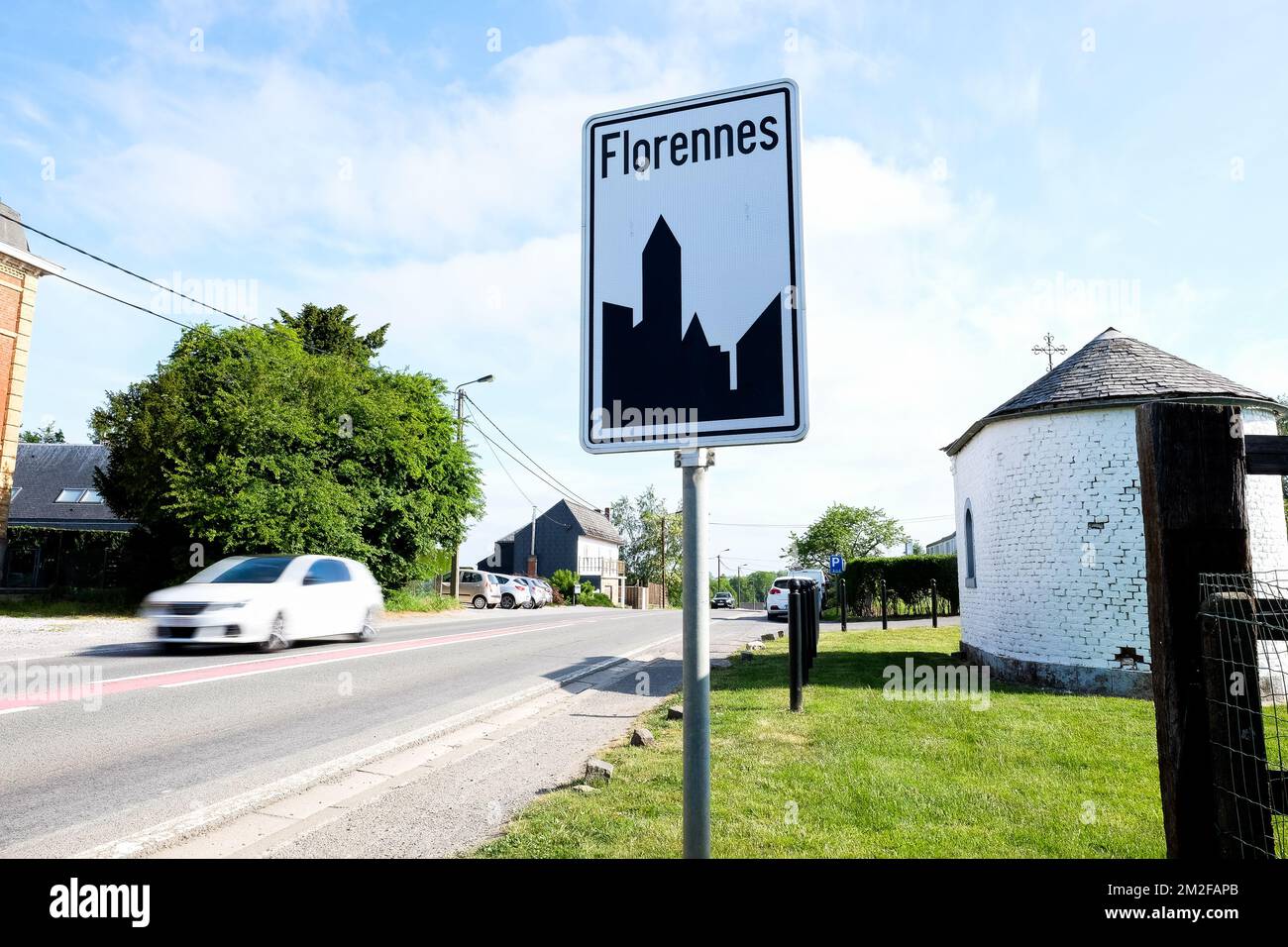 Illustration shows the name of the Florennes municipality on a road ...