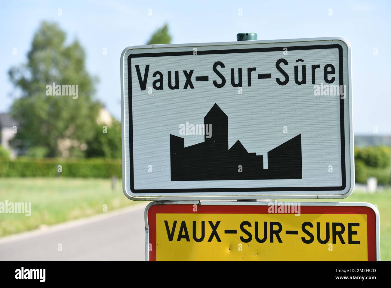 Illustration shows the name of the Vaux-Sur-Sure municipality on a road ...