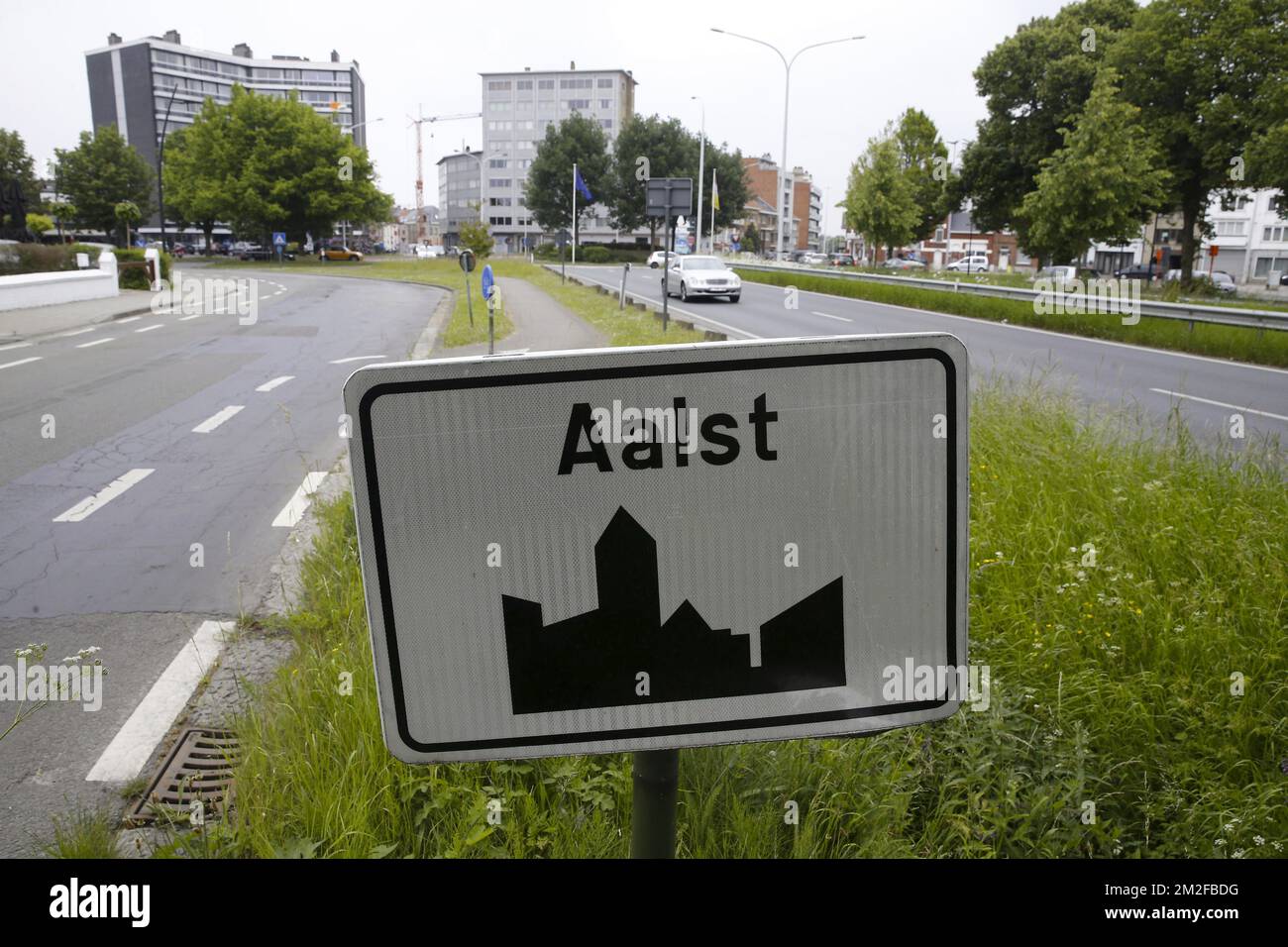Illustration shows the name of the Aalst municipality on a road sign ...