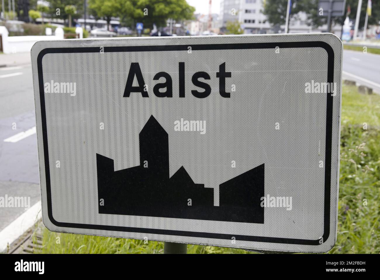 Illustration shows the name of the Aalst municipality on a road sign ...