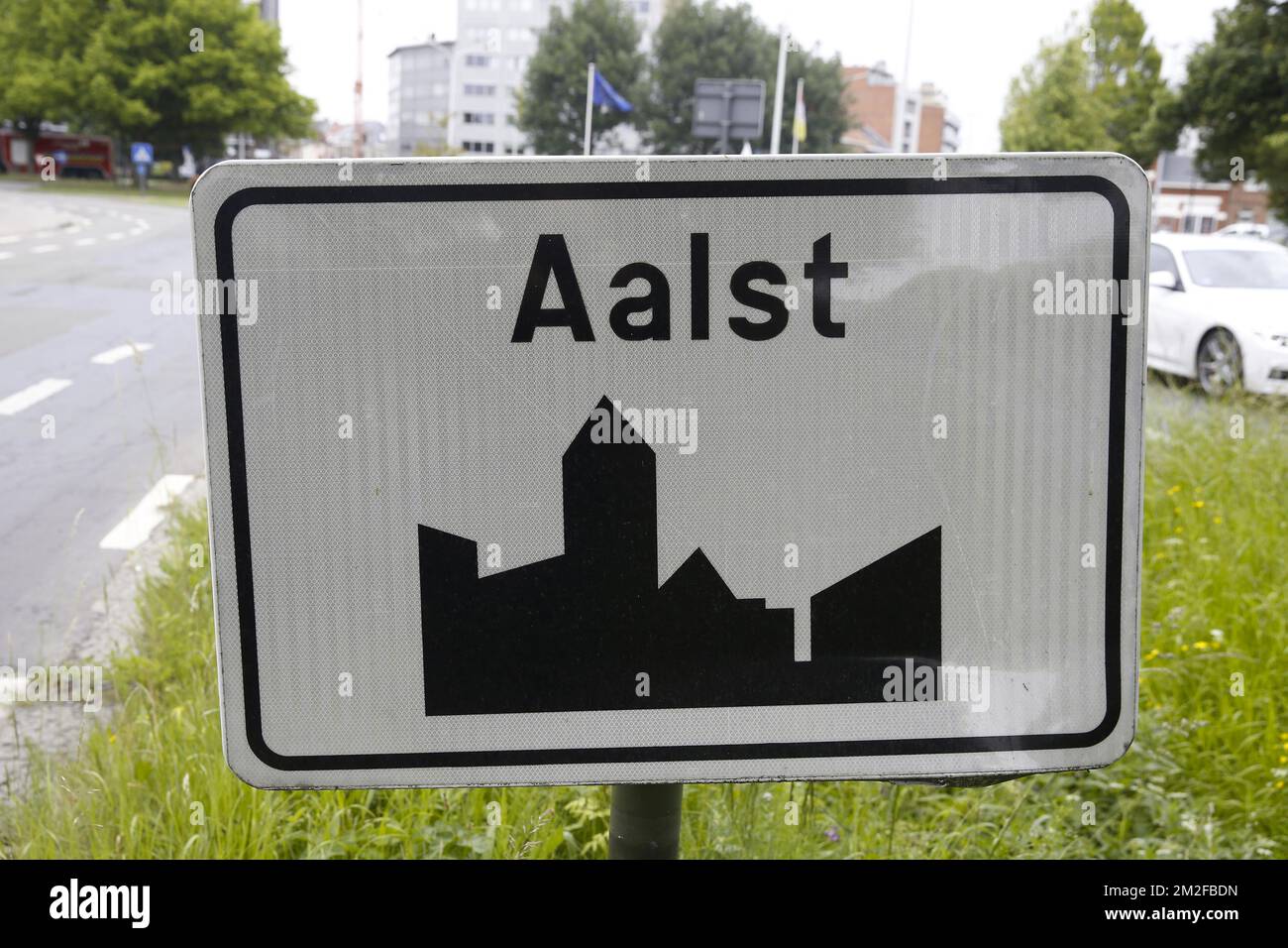 Illustration shows the name of the Aalst municipality on a road sign ...