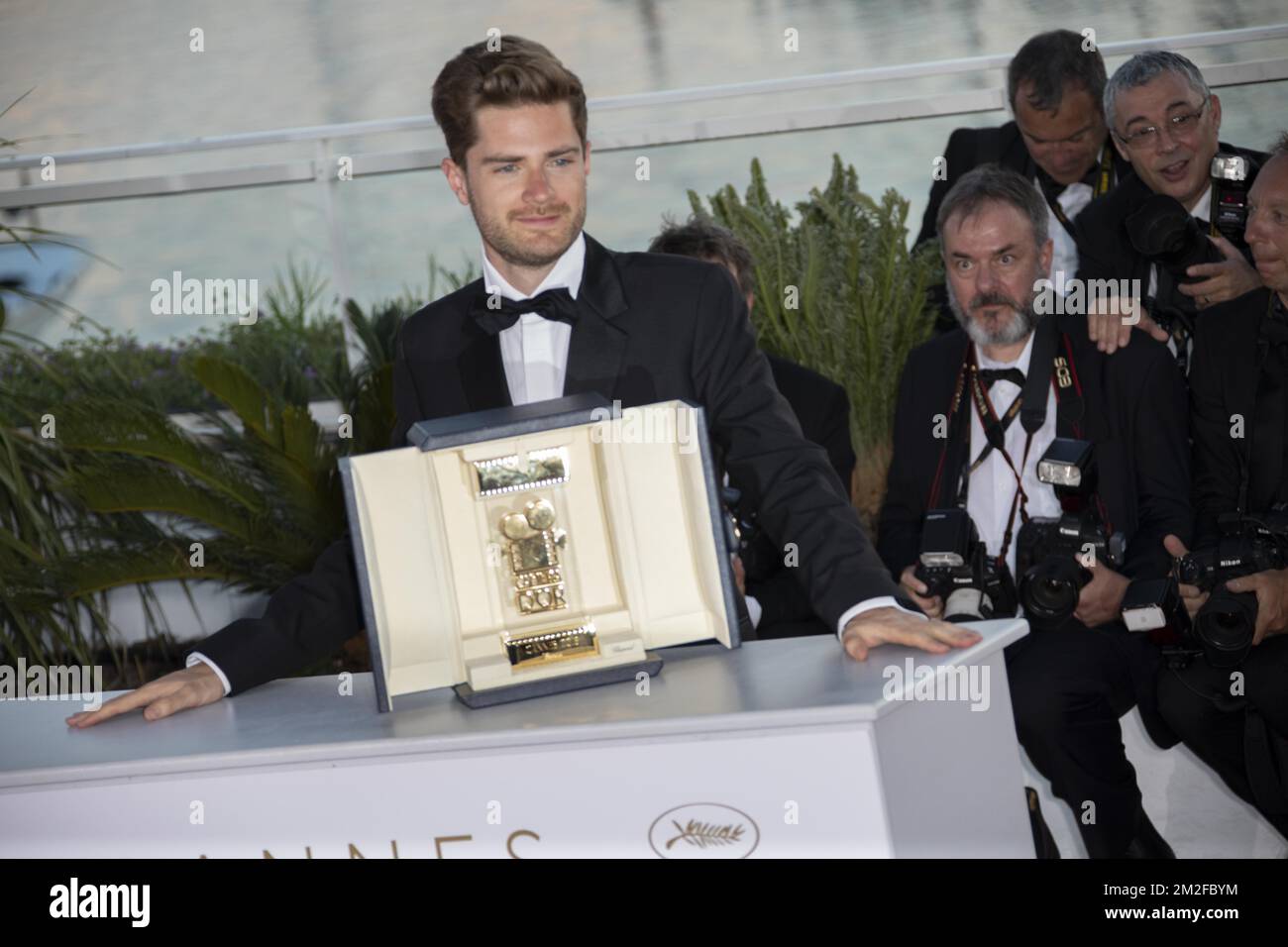 Lukas Dhont poses with the Best Director Camera d'Or jury award at the ...