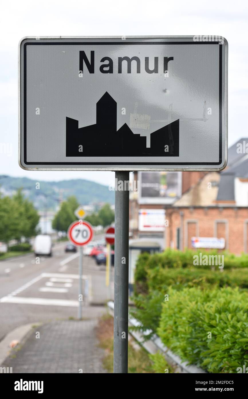 Illustration shows the name of the Namur municipality on a road sign ...