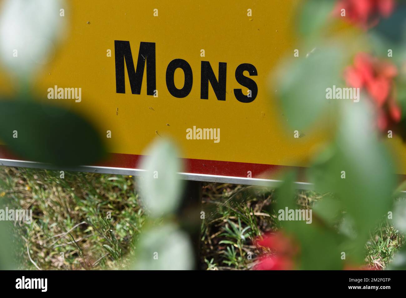 Illustration shows the name of the Mons municipality on a road sign ...