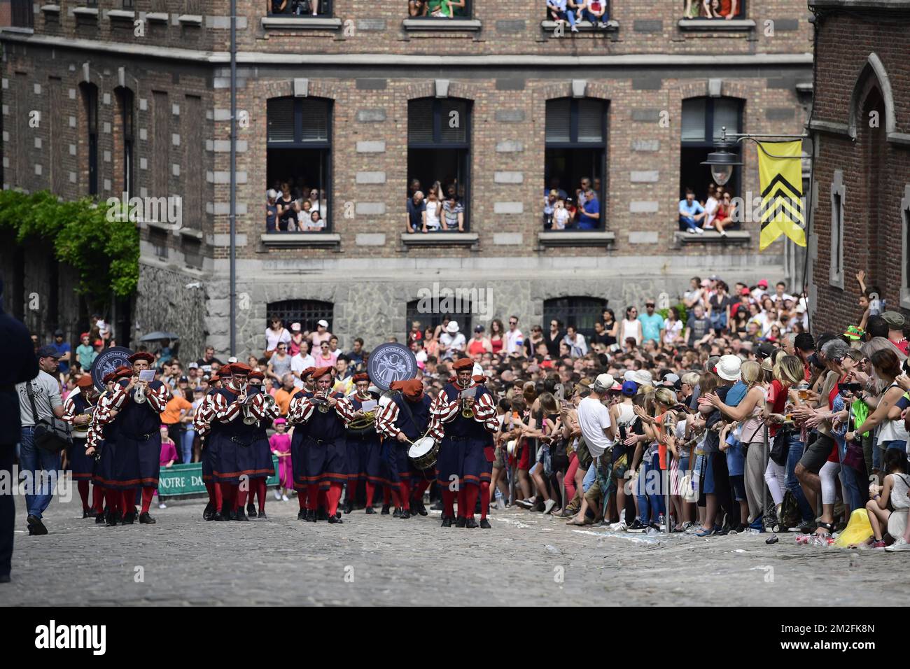 Musicians lead the procession, at the Ducasse - Doudou folkloric ...