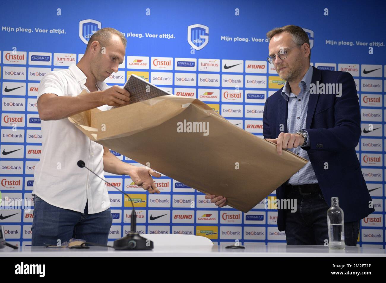 Genk's Thomas Buffel and Genk's chairman Peter Croonen pictured after a ...