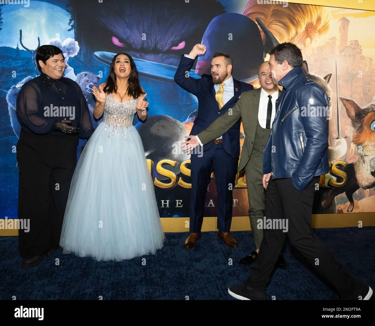 New York, New York, Dec. 13, 2022. (L-R) Harvey Guillén, Salma Hayek ...