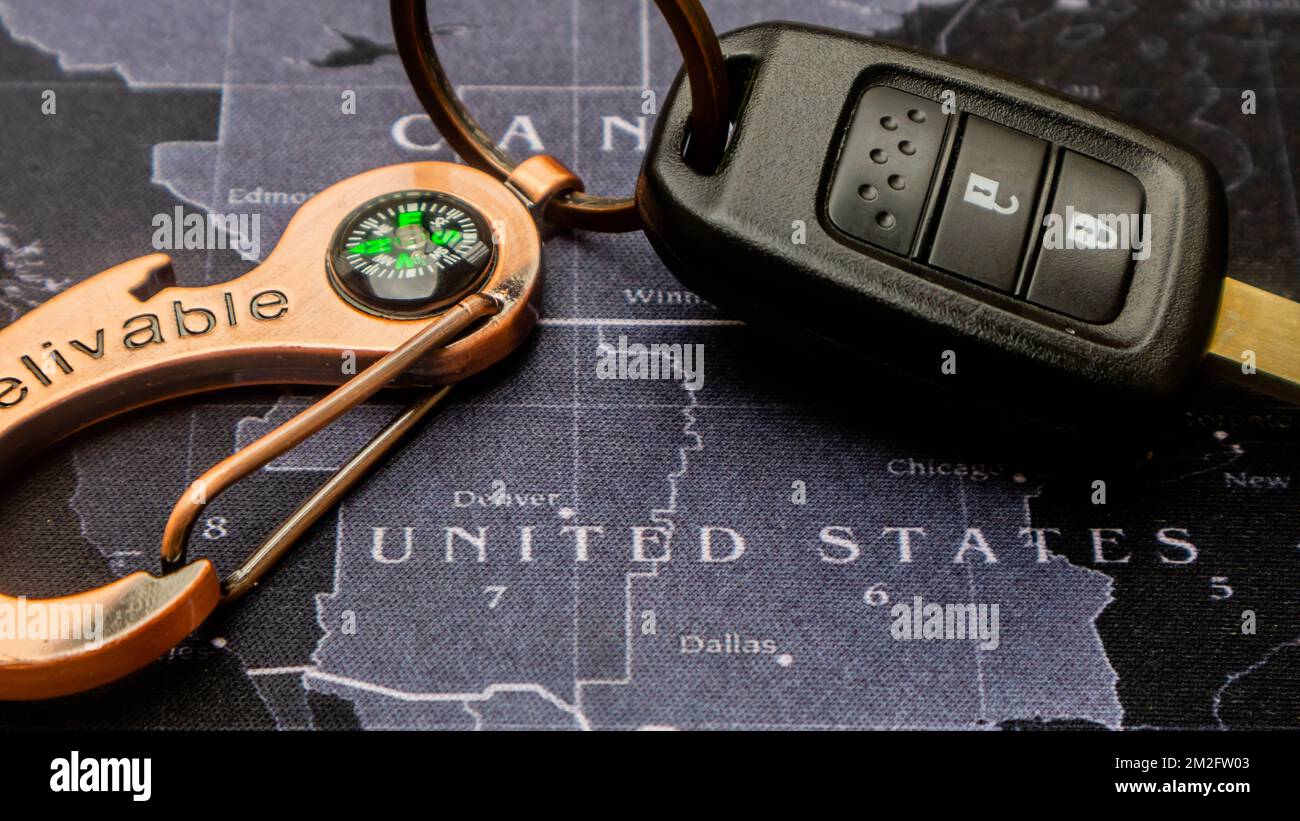 black car key over black map Stock Photo - Alamy