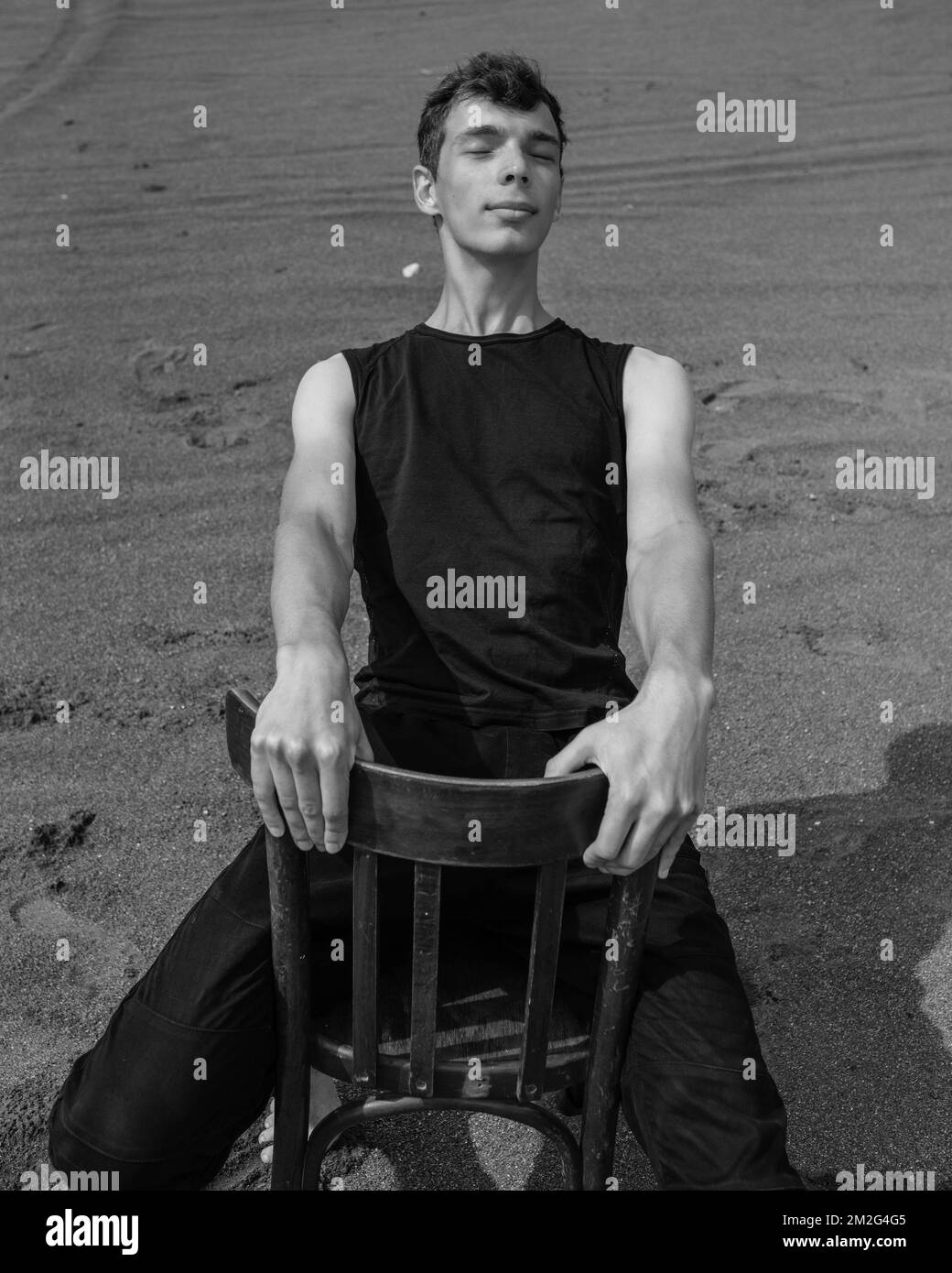 Sitting in chair barefoot hi-res stock photography and images - Alamy