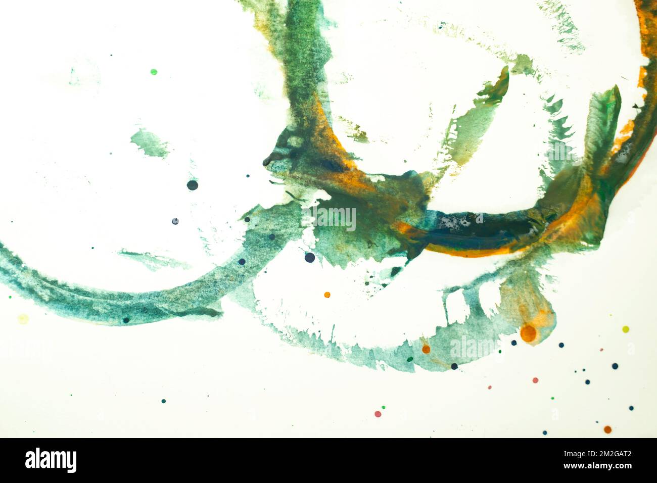 Aquarelle smudges with green and orange colors, close up, abstract ...