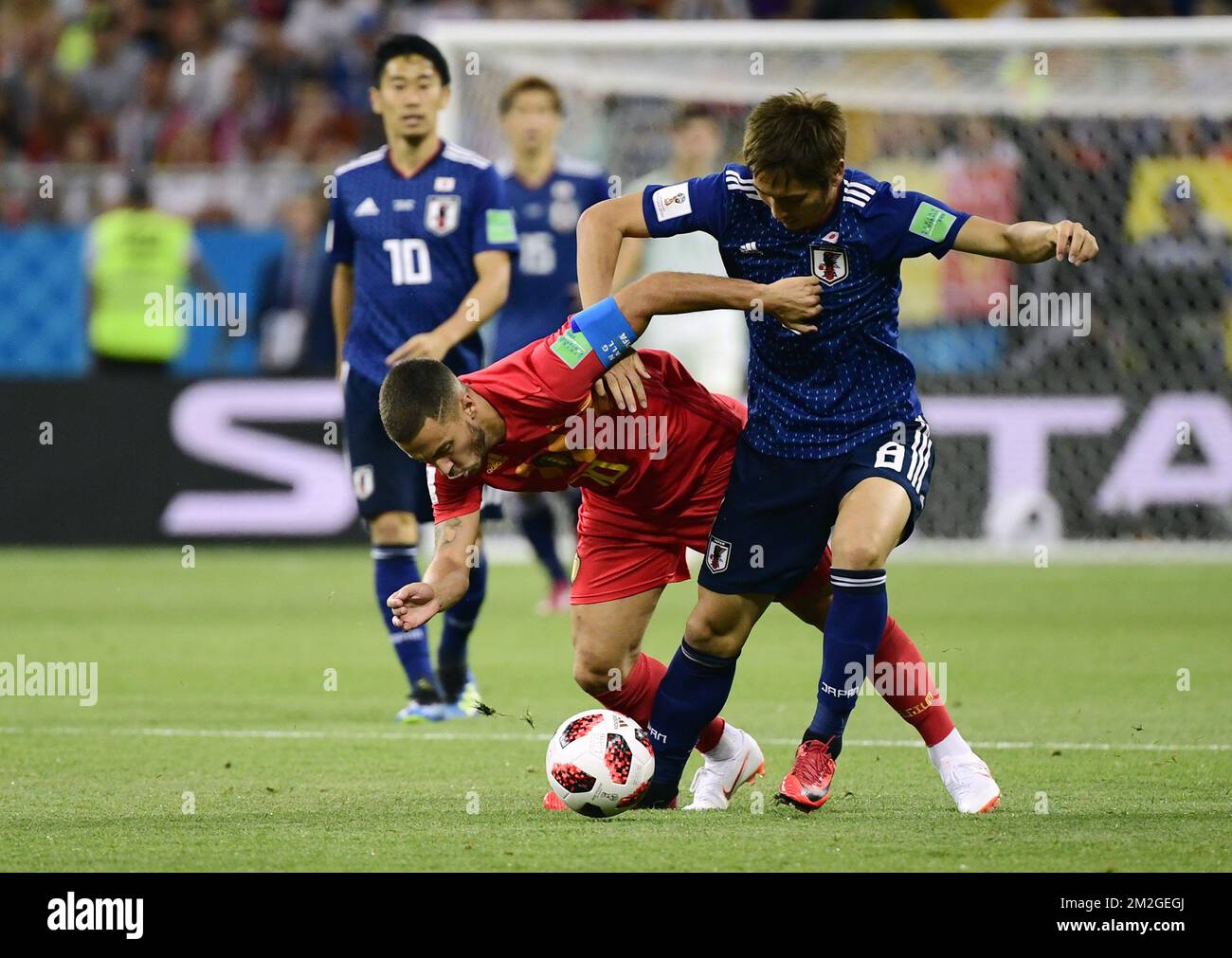 Belgium's Eden Hazard and Japan's Genki Haraguchi fight for the ball ...