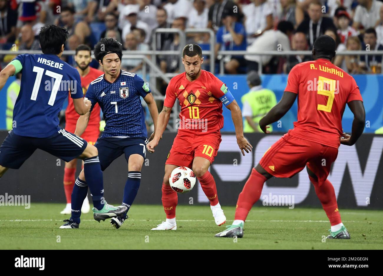 Japan's Gaku Shibasaki and Belgium's Eden Hazard fight for the ball ...