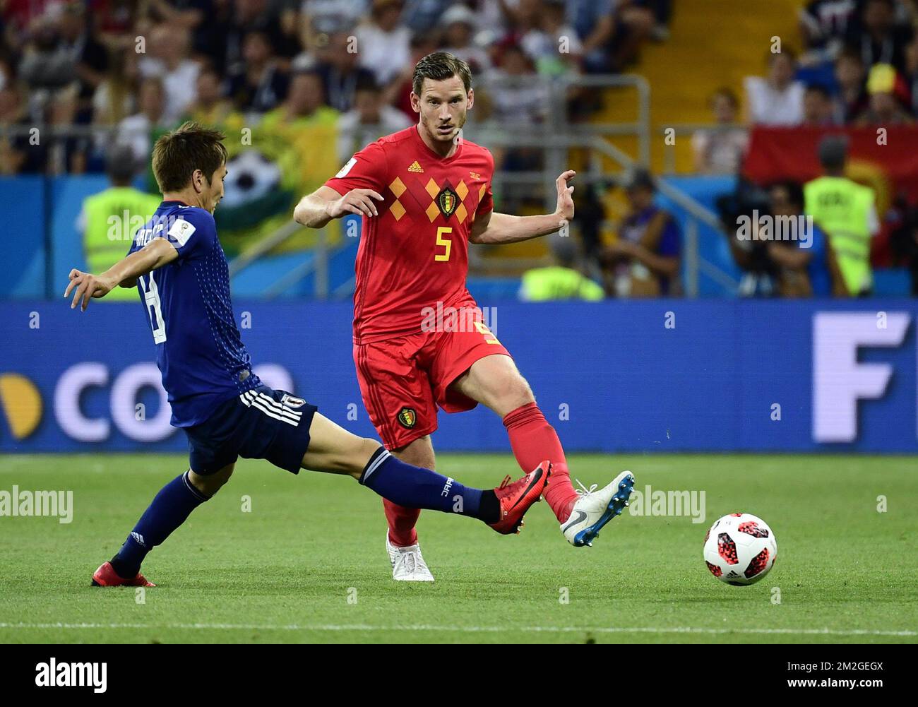 Japan's Genki Haraguchi and Belgium's Jan Vertonghen fight for the ball ...
