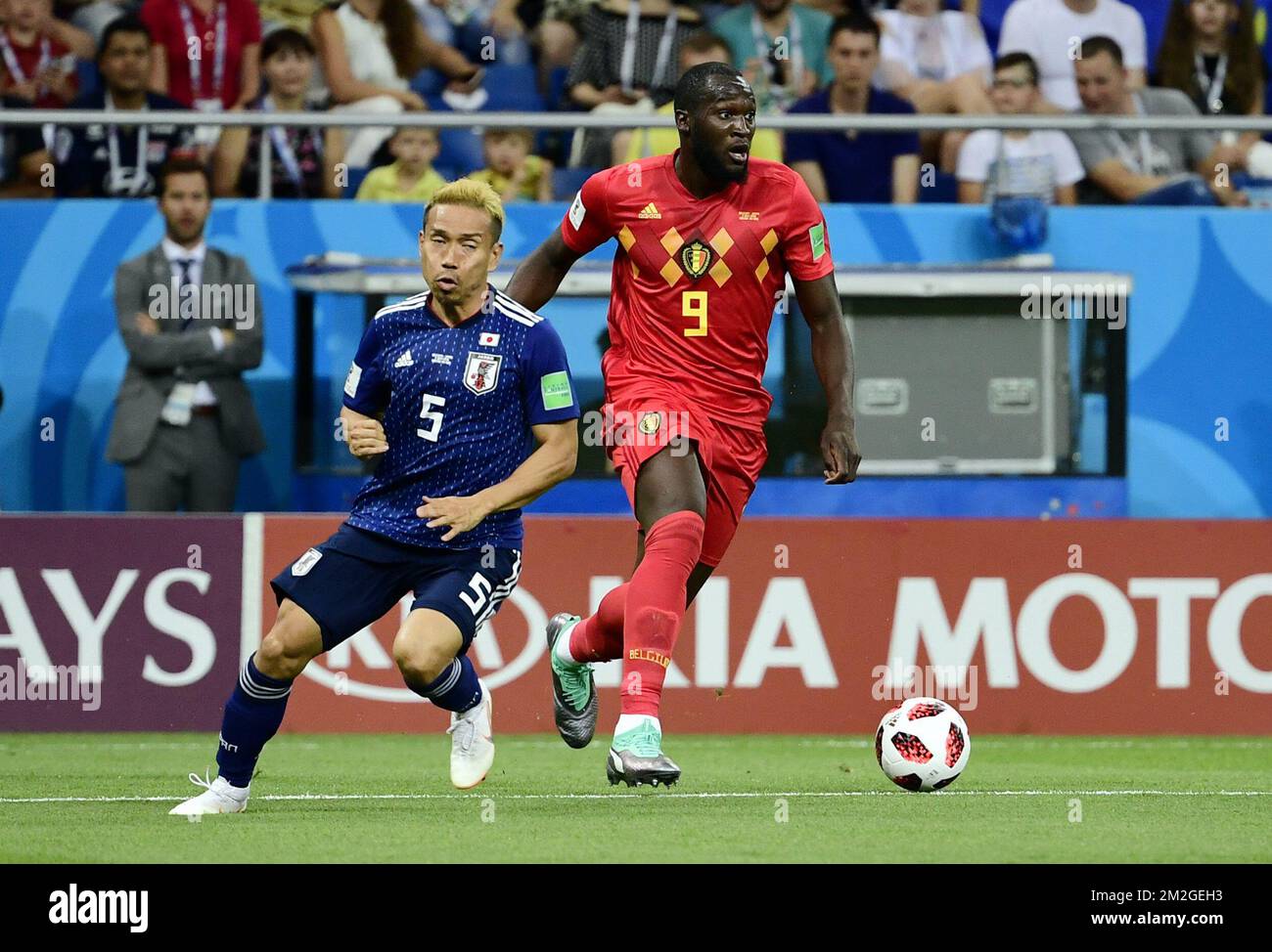 Japan's Yuto Nagatomo and Belgium's Romelu Lukaku fight for the ball ...