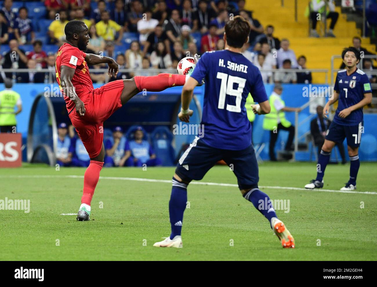Belgium's Romelu Lukaku and Japan's Hiroki Sakai fight for the ball ...