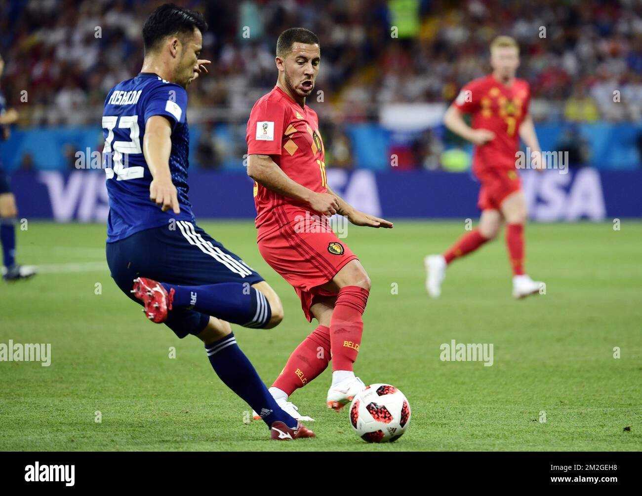 Japan's Maya Yoshida and Belgium's Eden Hazard fight for the ball ...