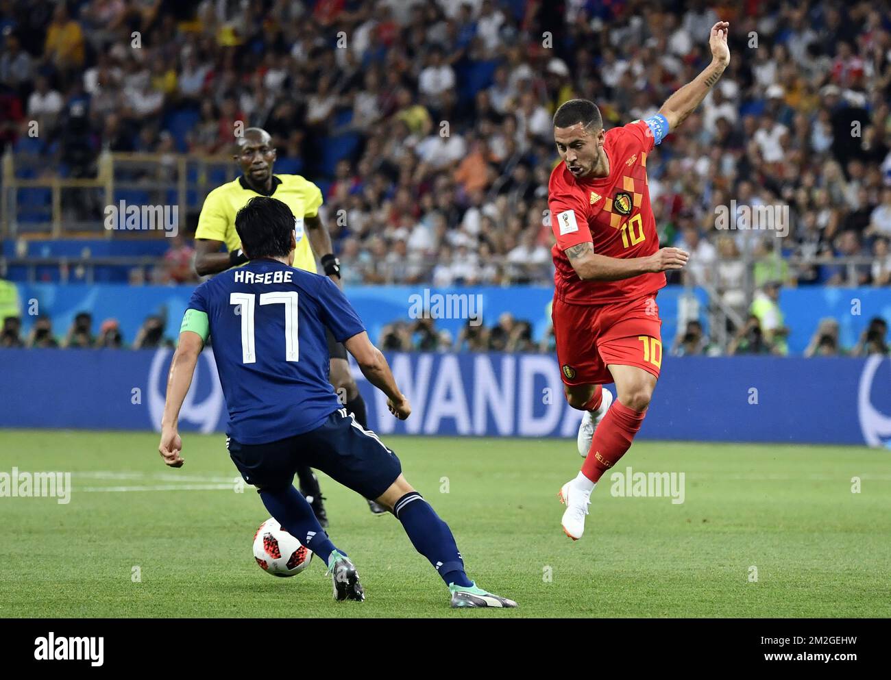 Japan's Takashi Usami and Belgium's Eden Hazard fight for the ball ...