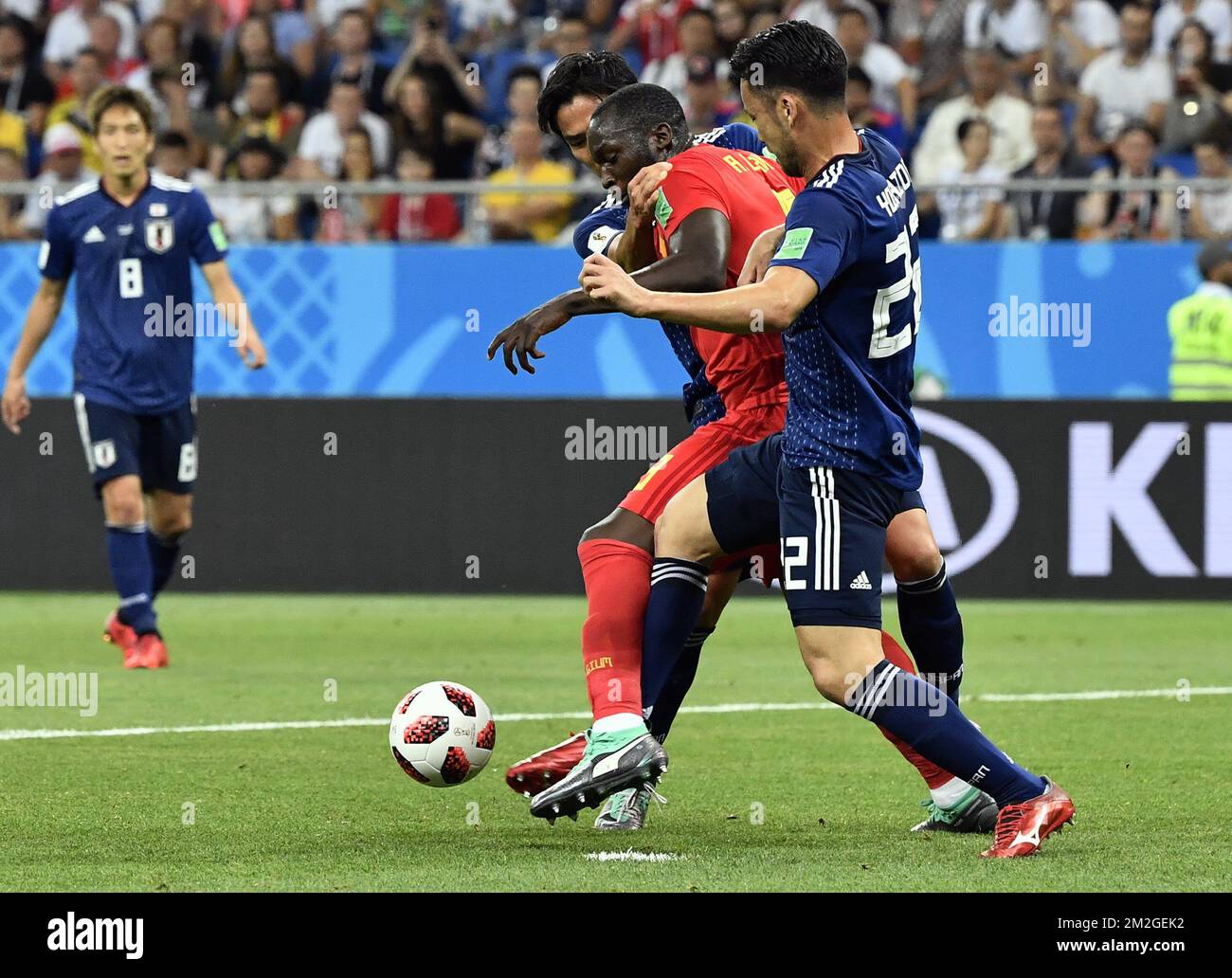 Belgium's Romelu Lukaku and Japan's Maya Yoshida fight for the ball ...