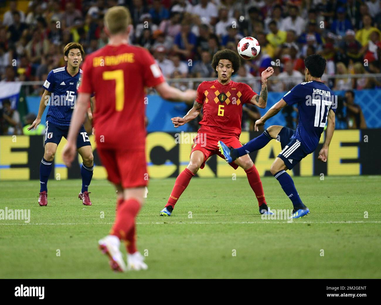Belgium's Axel Witsel and Japan's Shinji Kagawa fight for the ball ...