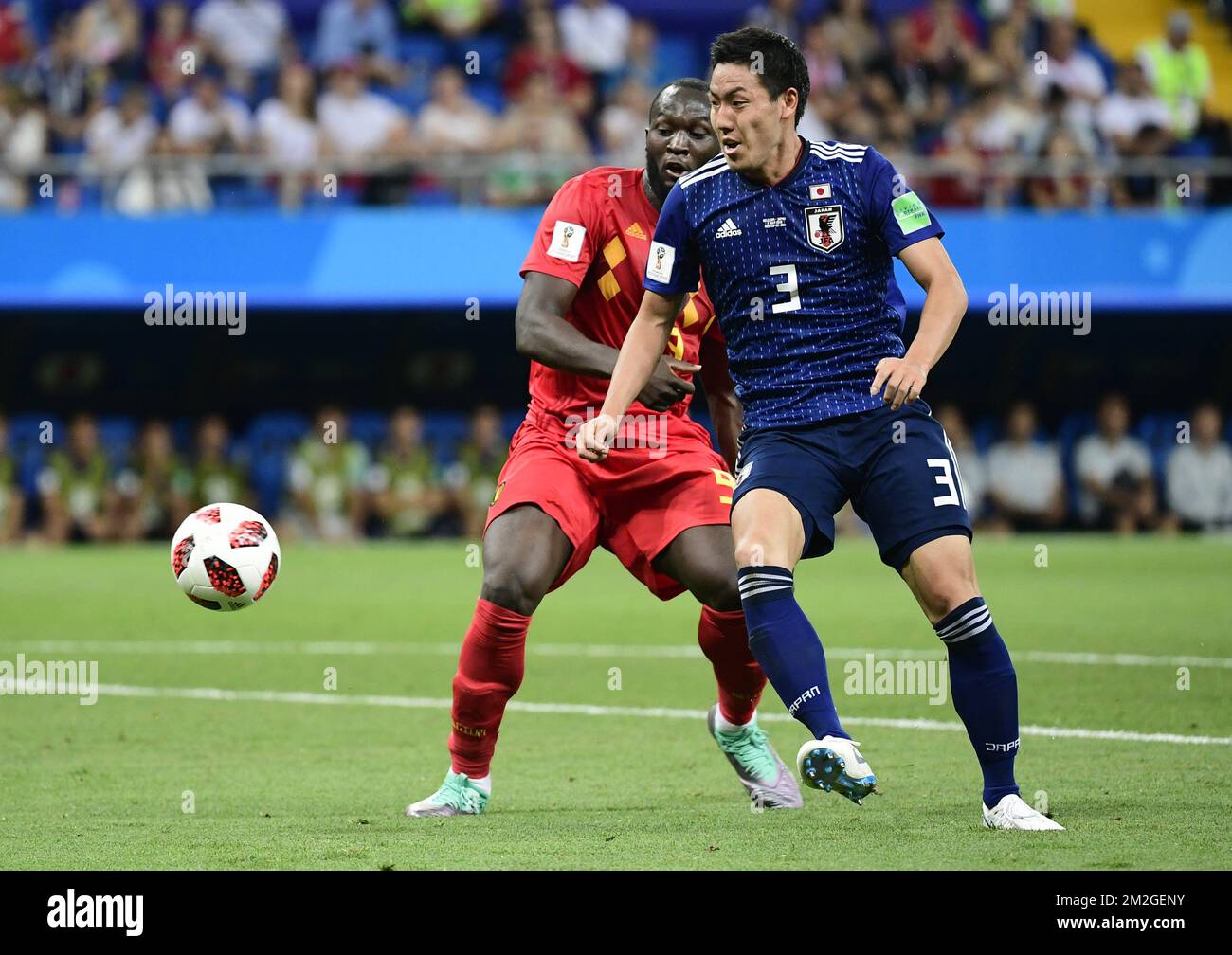 Belgium's Romelu Lukaku and Japan's Gen Shoji fight for the ball during ...