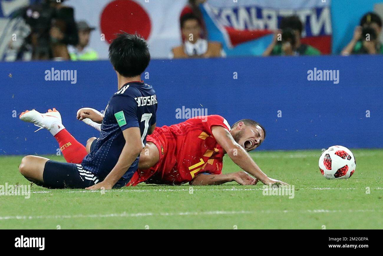 Japan's Gaku Shibasaki and Belgium's Eden Hazard fight for the ball ...