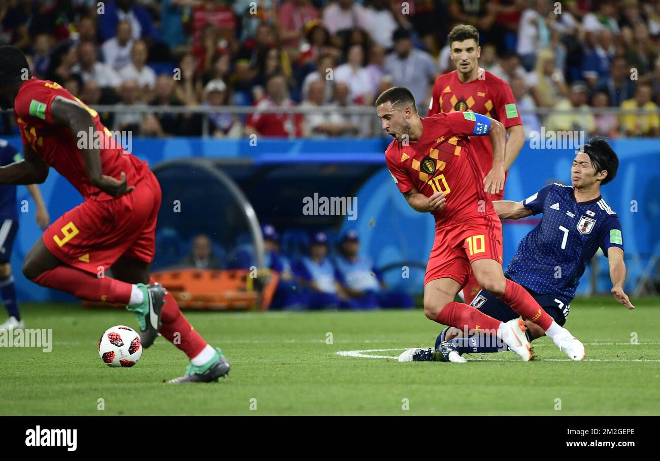 Belgium's Eden Hazard and Japan's Gaku Shibasaki fight for the ball ...