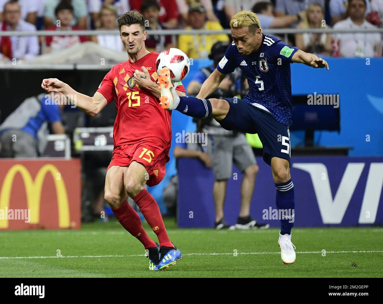 Belgium's Thomas Meunier and Japan's Yuto Nagatomo fight for the ball ...