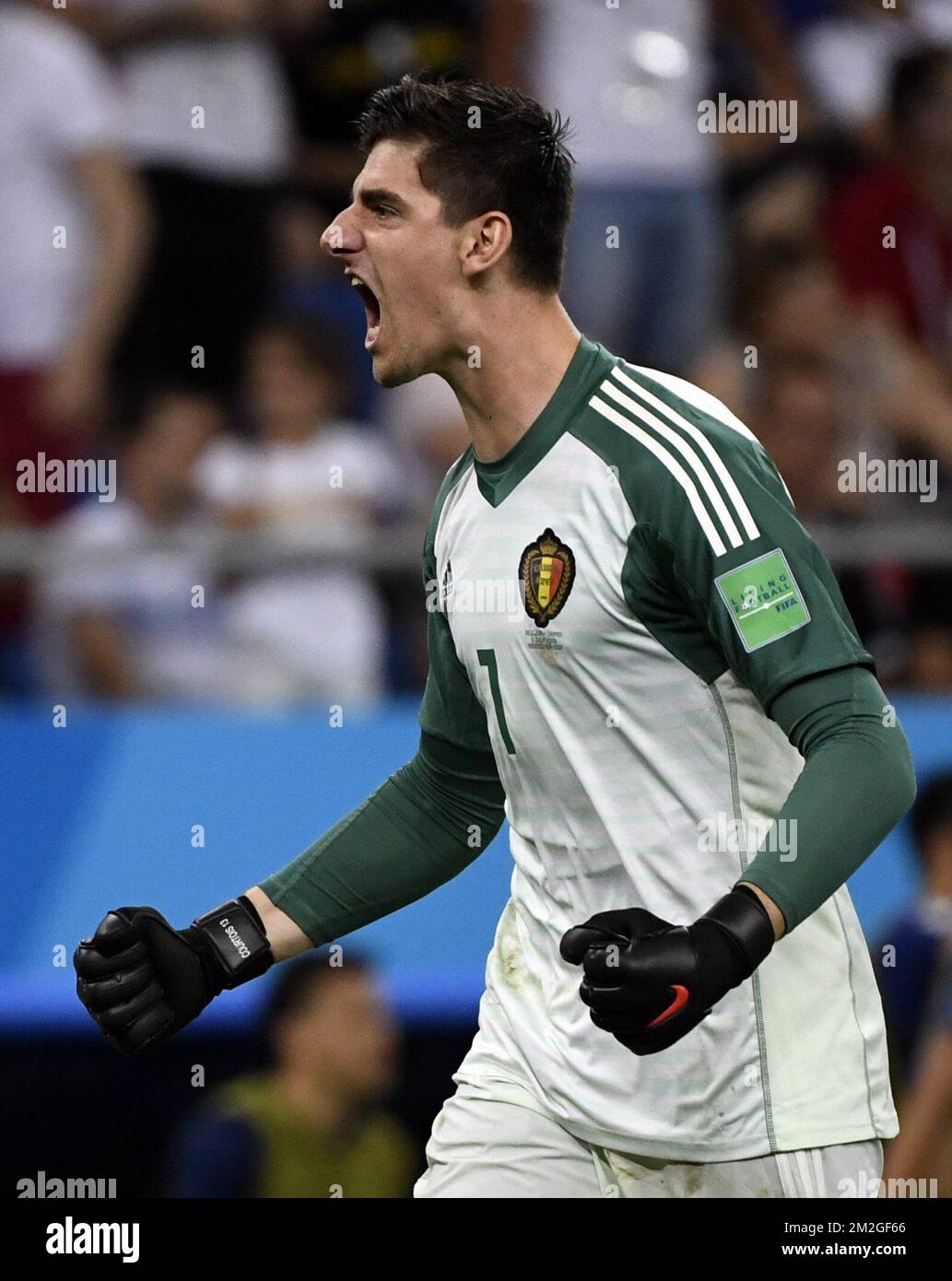 Belgium's goalkeeper Thibaut Courtois celebrates after winning a round ...