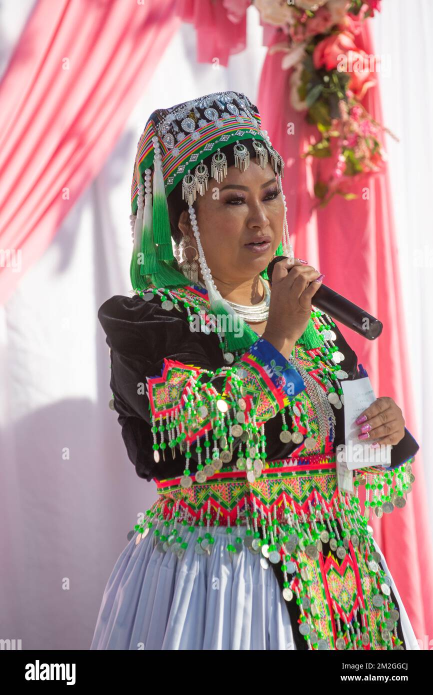 Female MC in traditional costume at the Hmong New Year Celebration at ...
