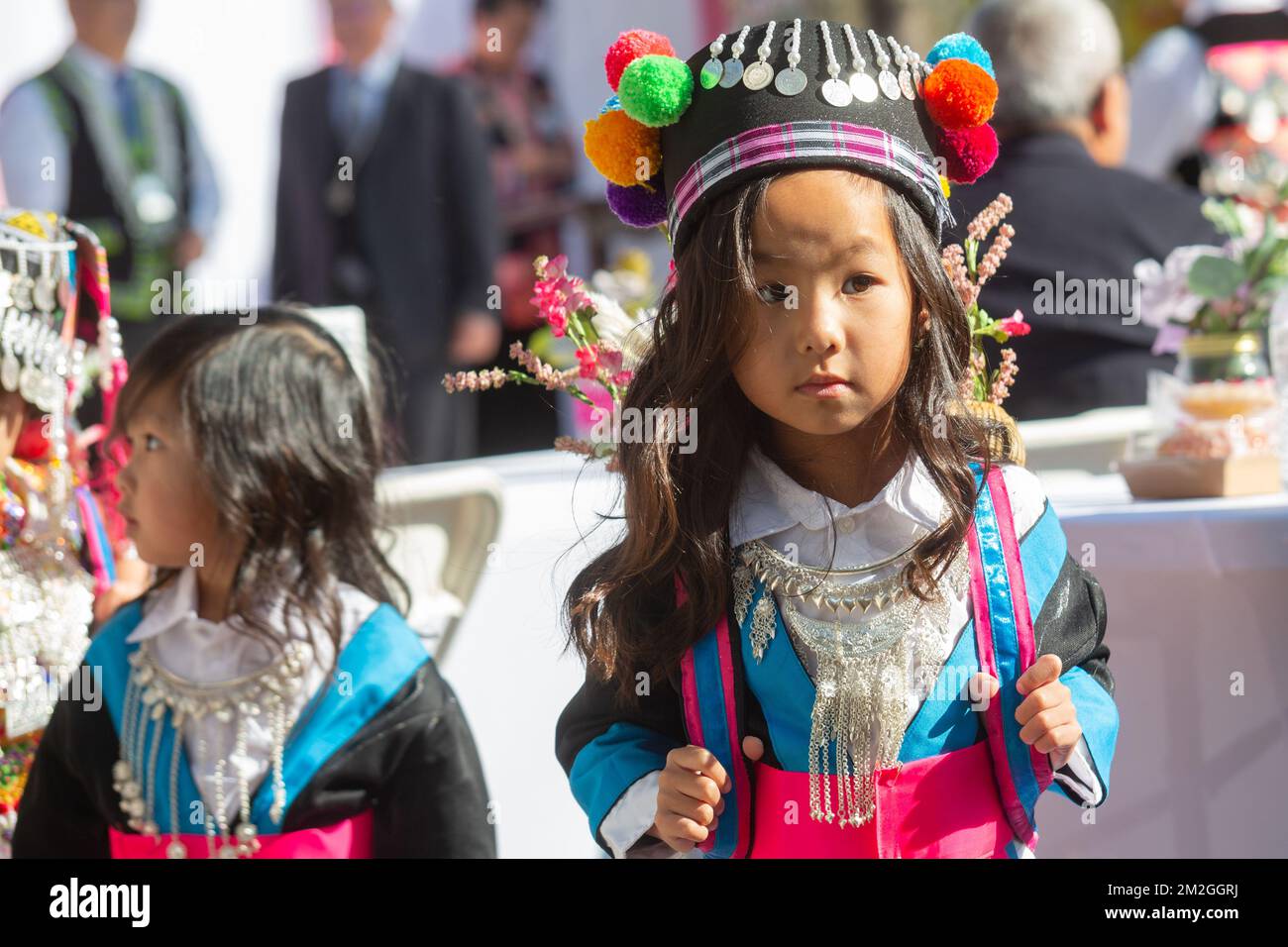 Child dressed in traditional Hmong attire at the Hmong New Year ...