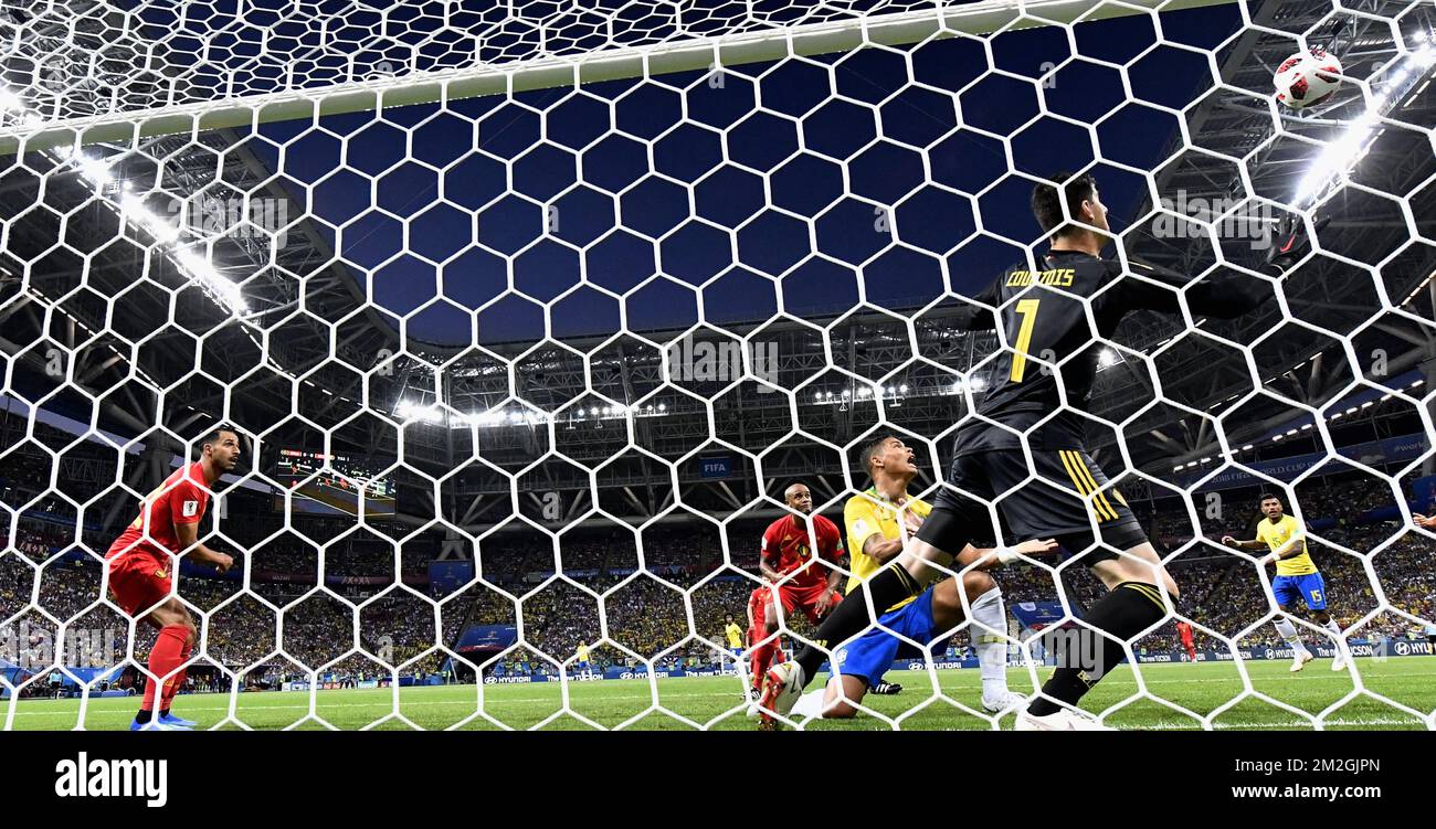 A picture taken behind the goal shows Belgium's goalkeeper Thibaut ...