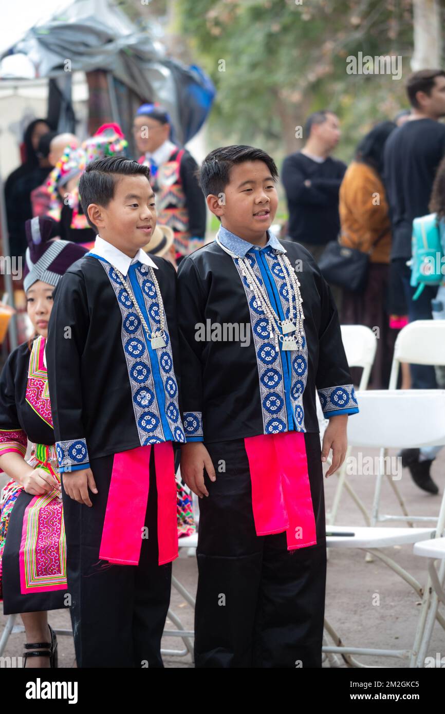 Two boys in traditional attire at the Hmong New Year Celebration at El ...