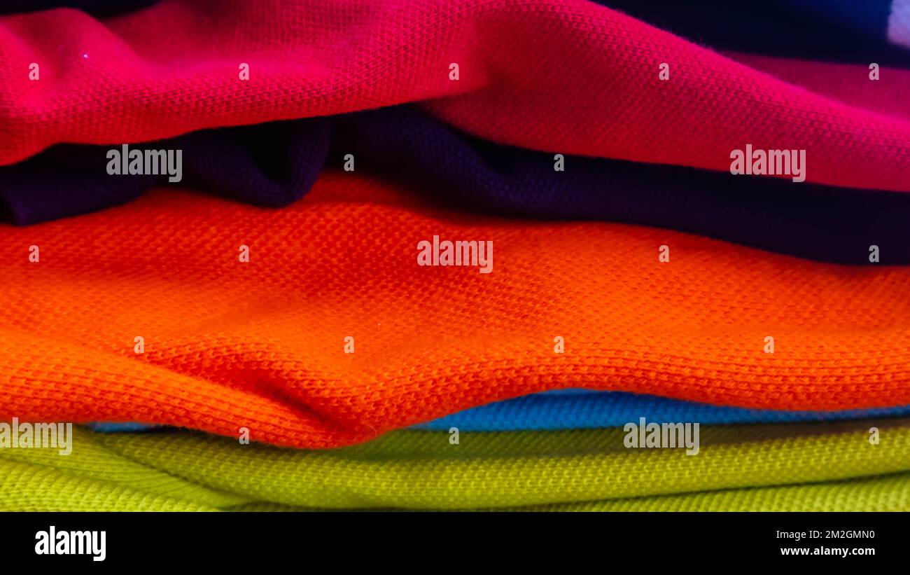 pile of clothes as background Stock Photo - Alamy