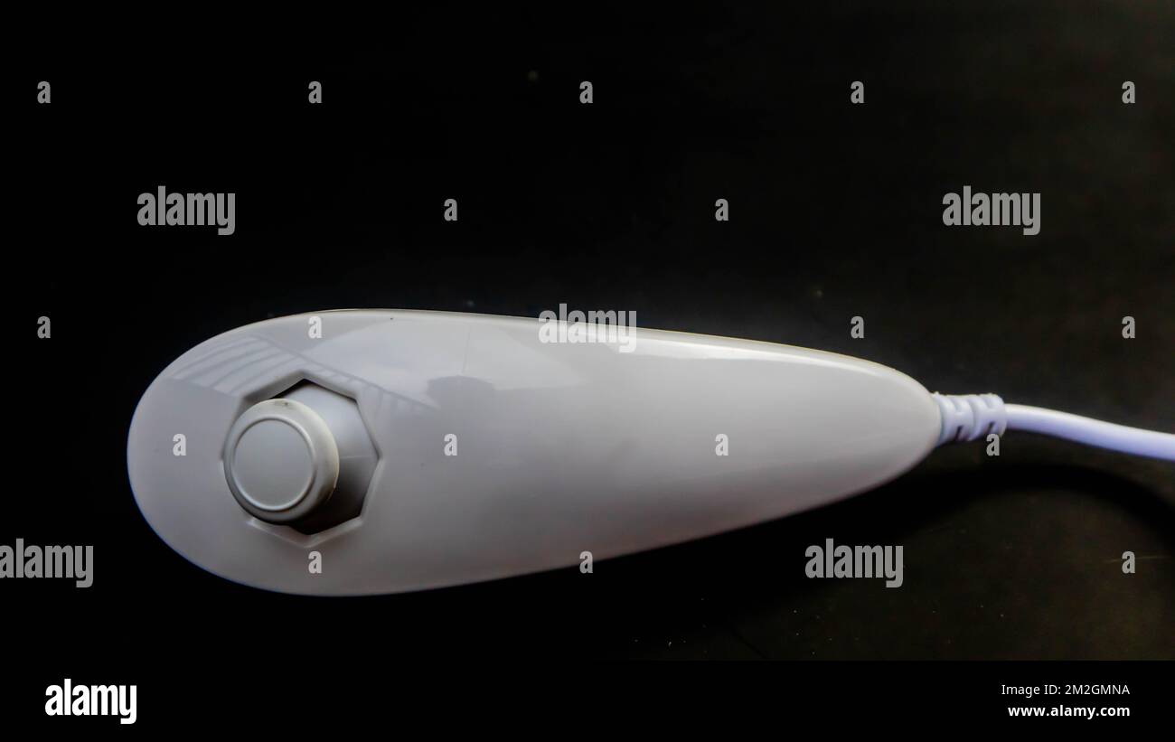 white joystick isolated on black background Stock Photo - Alamy