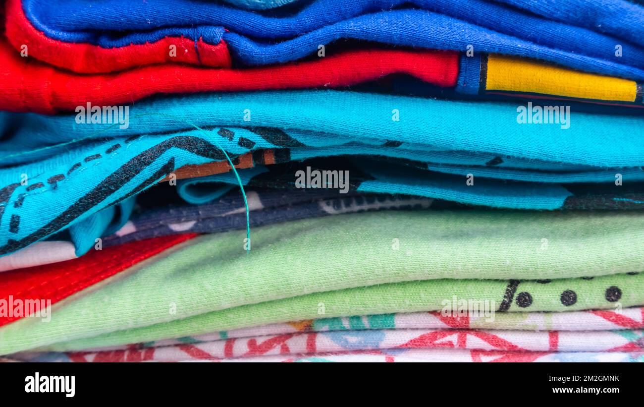 pile of clothes as background Stock Photo - Alamy