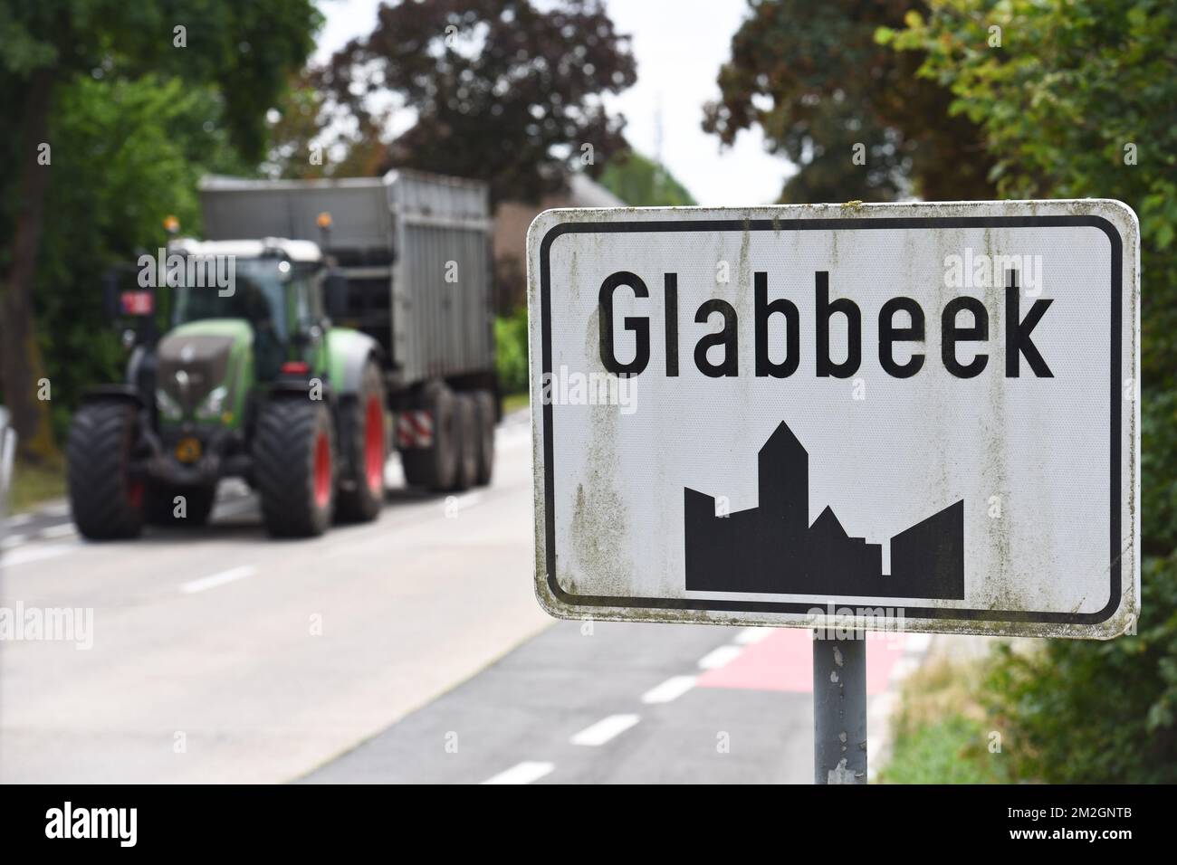 Illustration shows the name of the Glabbeek municipality on a road sign ...