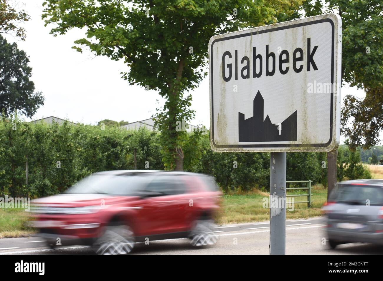 Illustration shows the name of the Glabbeek municipality on a road sign ...