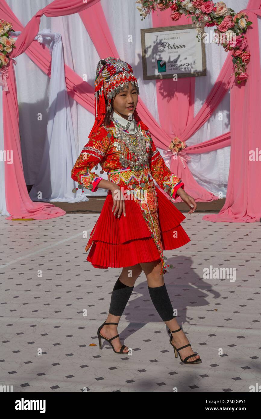 Girl models a modernized Hmong outfit at a fashion show during the ...